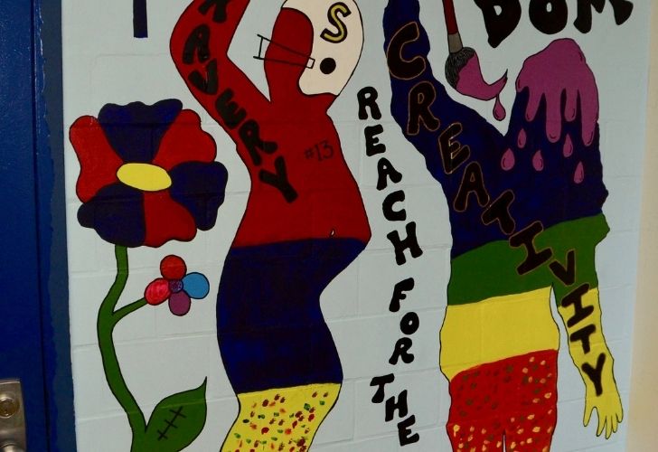 Students paint murals with messages of unity and diversity in Seaford ...